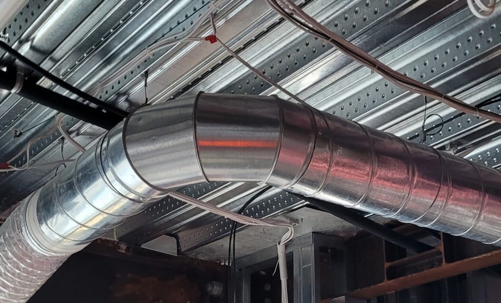 Standard Hanger with 90° Eyelet Streamlines Ductwork Install - Gripple ...